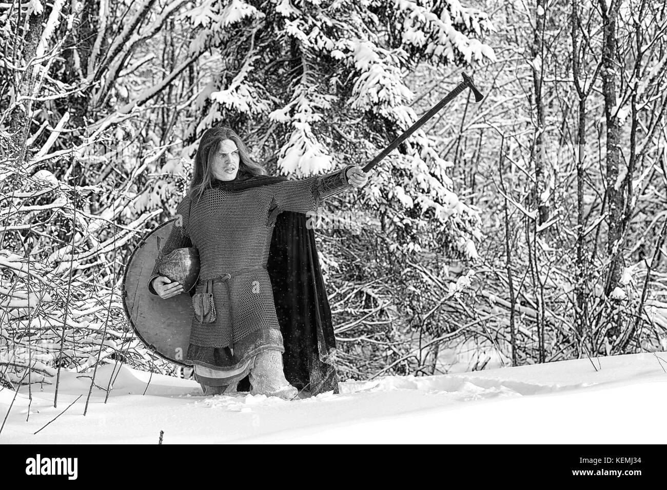 Defender the young warrior in armor Stock Photo - Alamy
