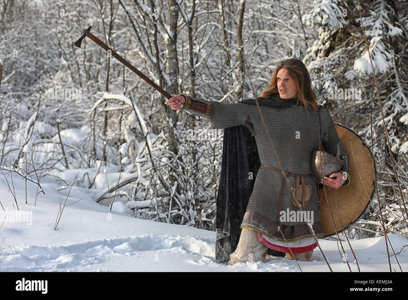 Defender the young warrior in mail armor Stock Photo - Alamy