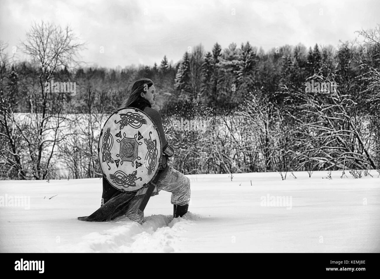 Defender the young warrior in armor Stock Photo - Alamy