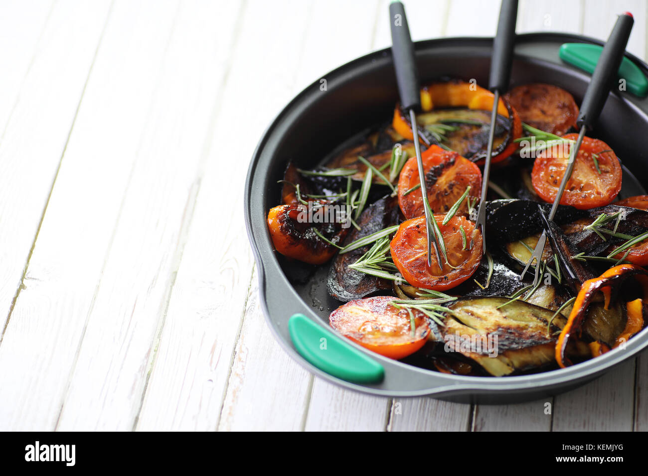 Vegetables grilled pan fried eggplant and tomatoes Stock Photo - Alamy