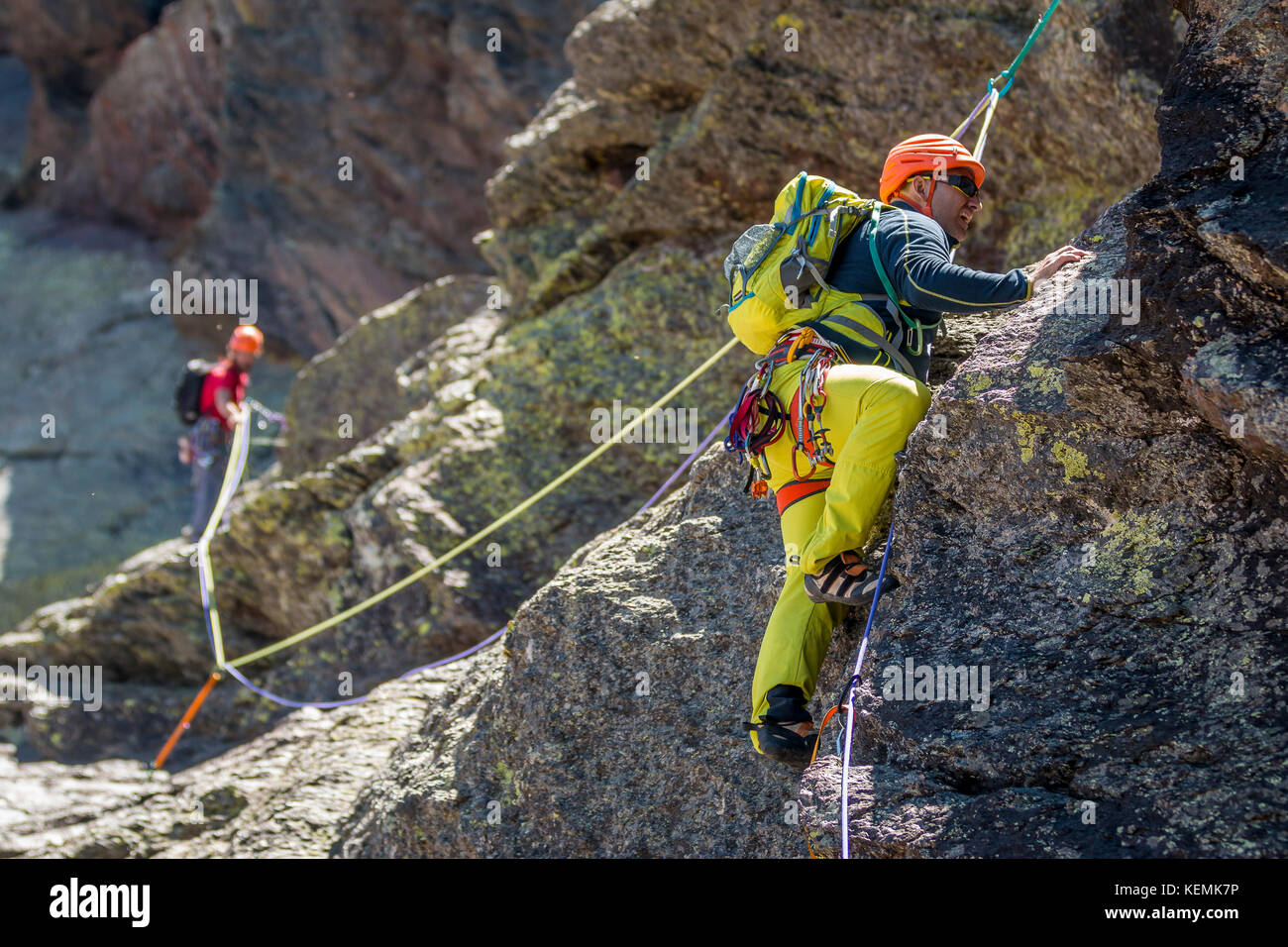 Two men climbing up in hi-res stock photography and images - Alamy