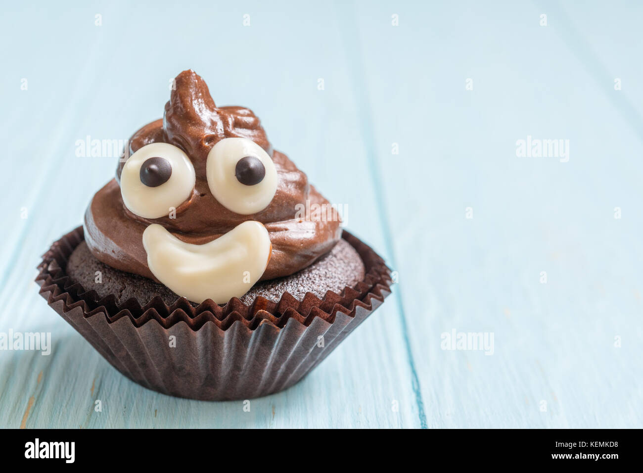 Funny poop emoji chocolate cupcakes. Cute food dessert Stock Photo - Alamy