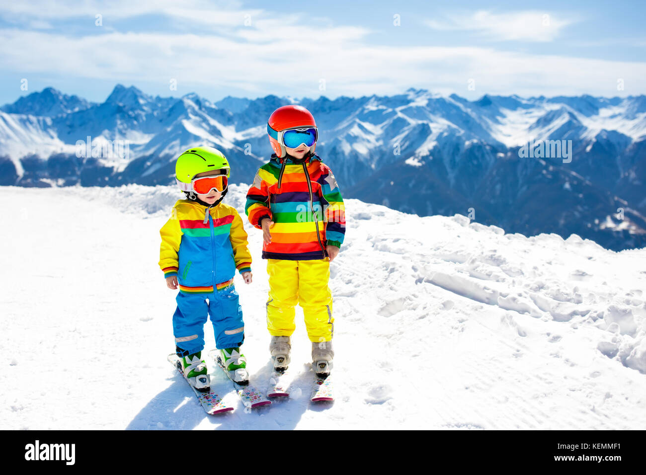 Child skiing in the mountains. Kid in ski school. Winter sport for kids ...