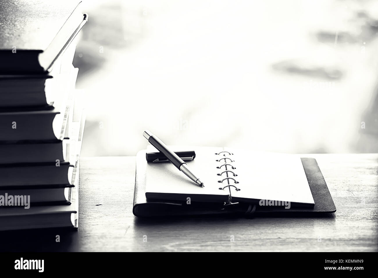 A stack of textbooks on a table Stock Photo - Alamy