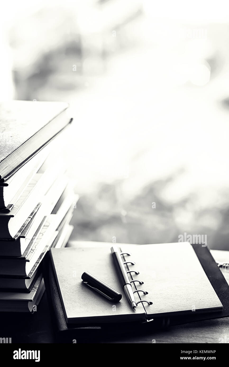 A stack of textbooks on a table Stock Photo - Alamy