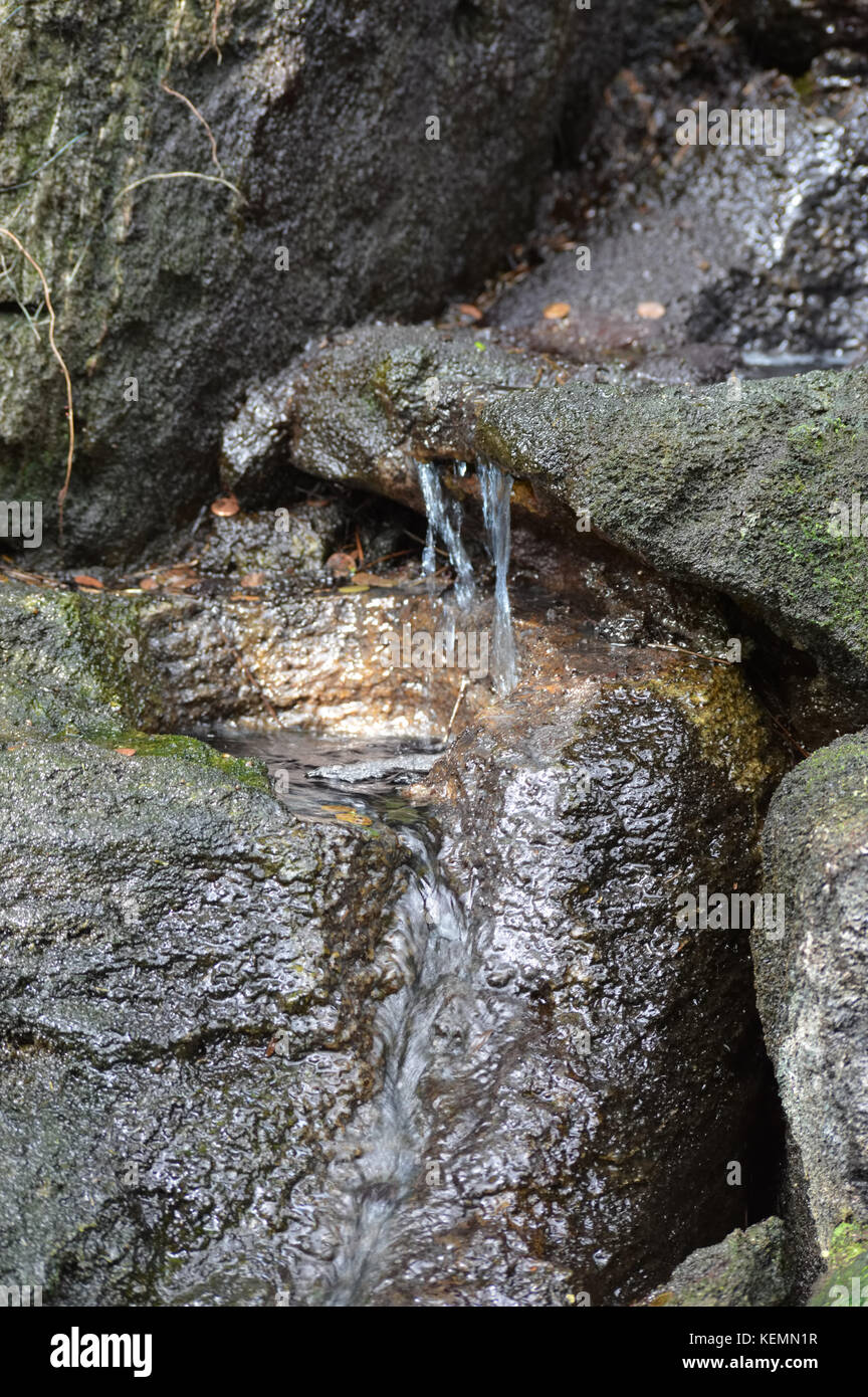 Small waterfall on the rocks Stock Photo - Alamy