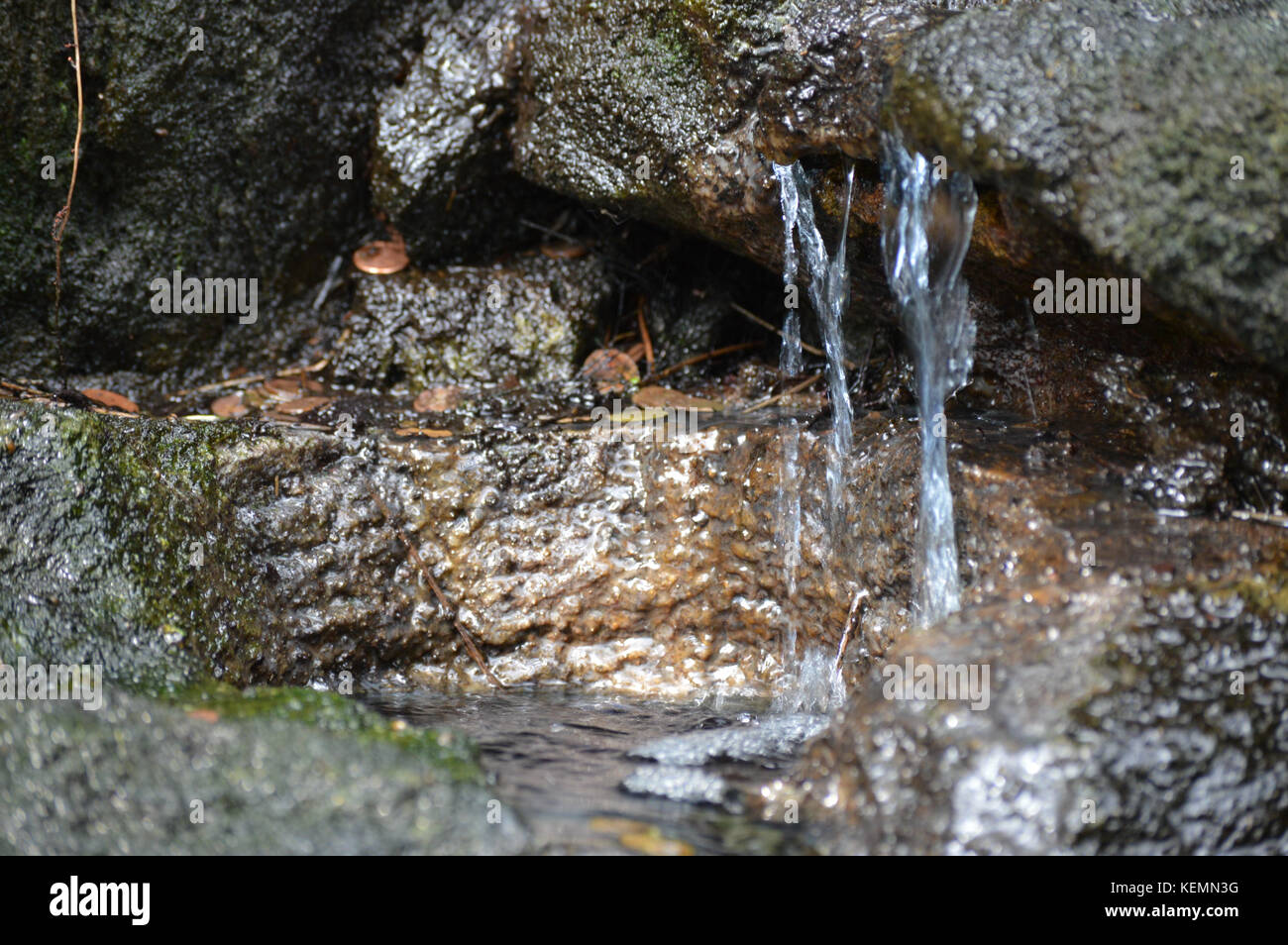 Small waterfall on the rocks Stock Photo - Alamy