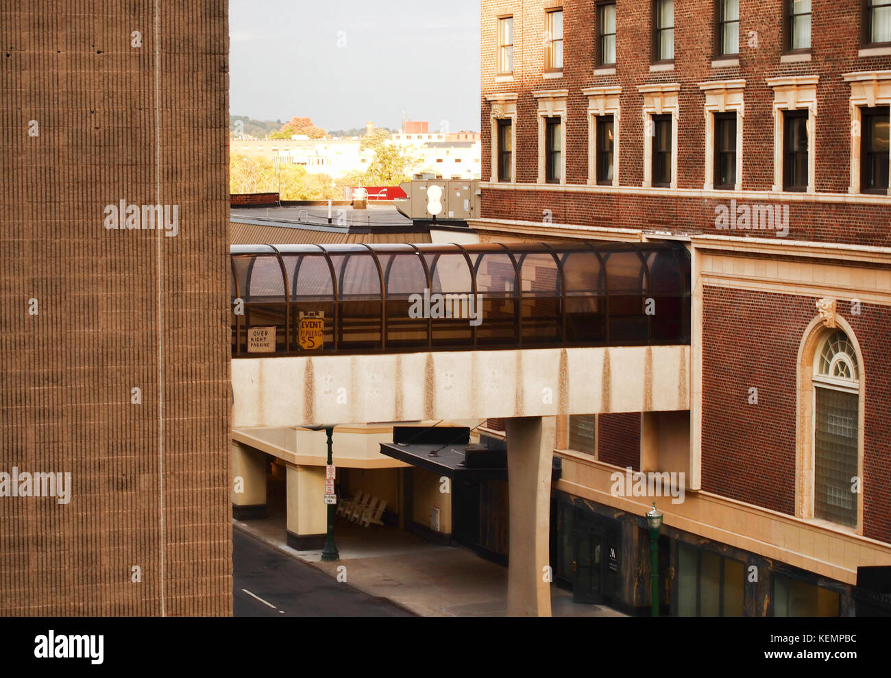 Pedestrian walkway between buildings in a city Stock Photo - Alamy