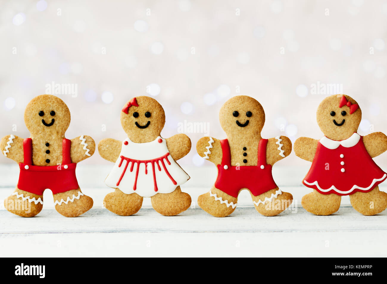 Row of gingerbread men against a background of Christmas lights Stock ...