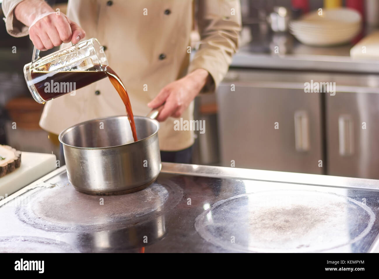 Pouring broth into pot hi-res stock photography and images - Alamy