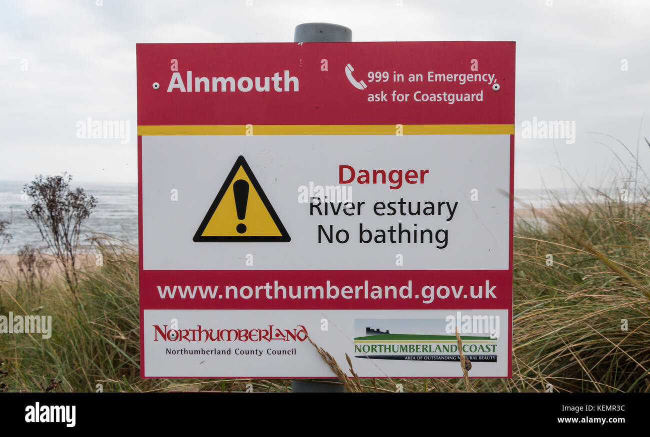 Sign warning of dangerous bathing conditions in the Aln river estuary ...