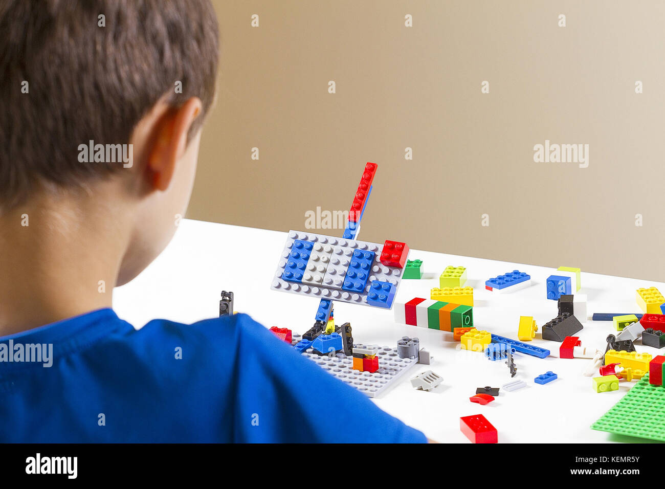 Boy playing with Lego construction toy blocks Stock Photo - Alamy