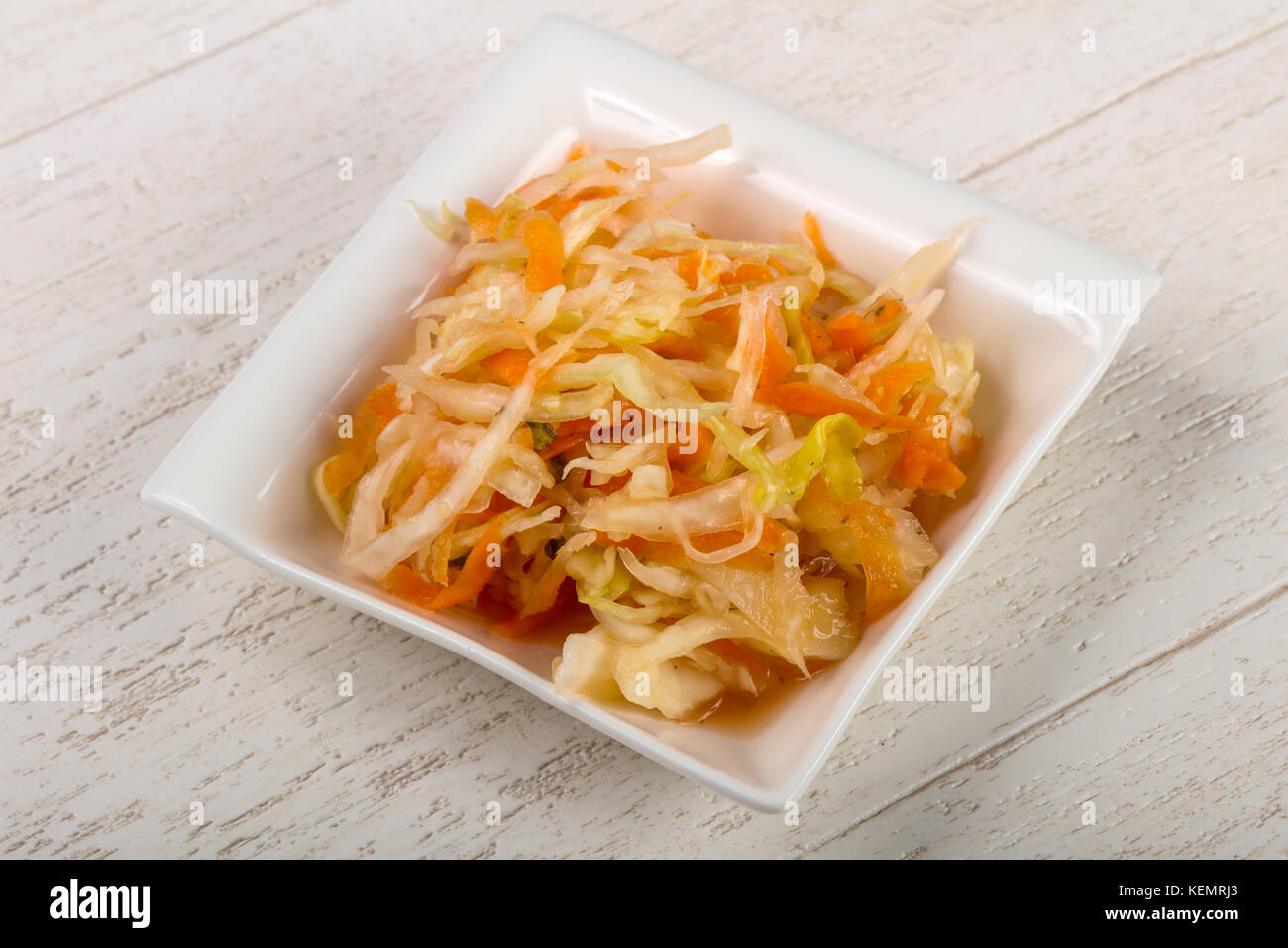 Raw pickled cabbage on wood background Stock Photo - Alamy