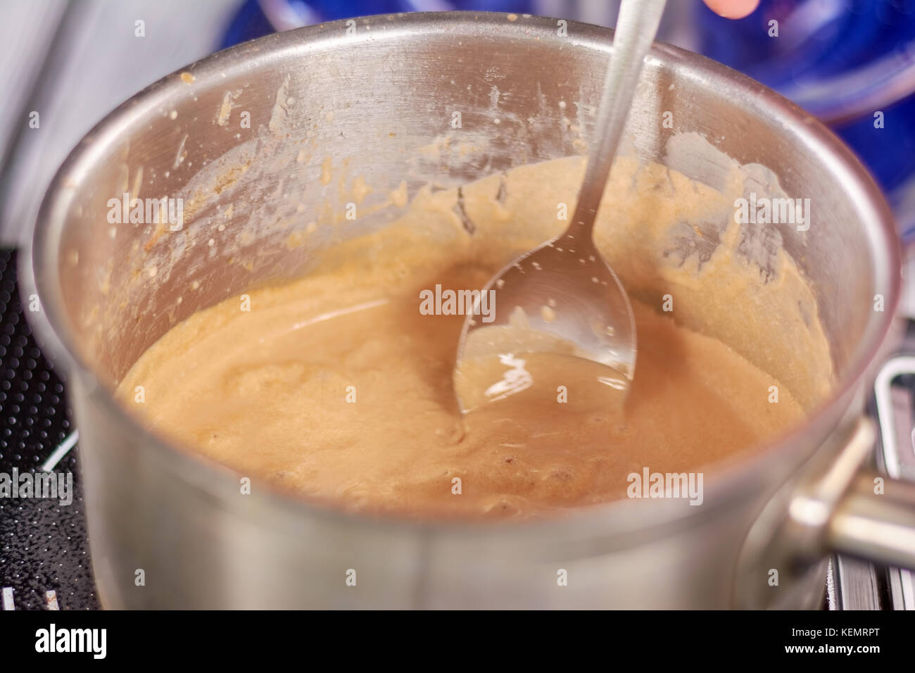 Vegetable soup cooking in saucepan. The process of preparing vegetable ...