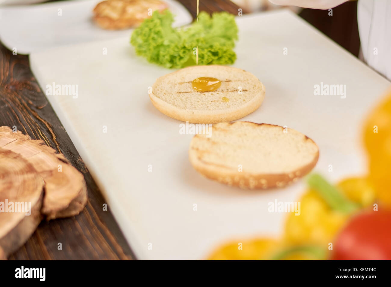 Burger making process hi-res stock photography and images - Alamy