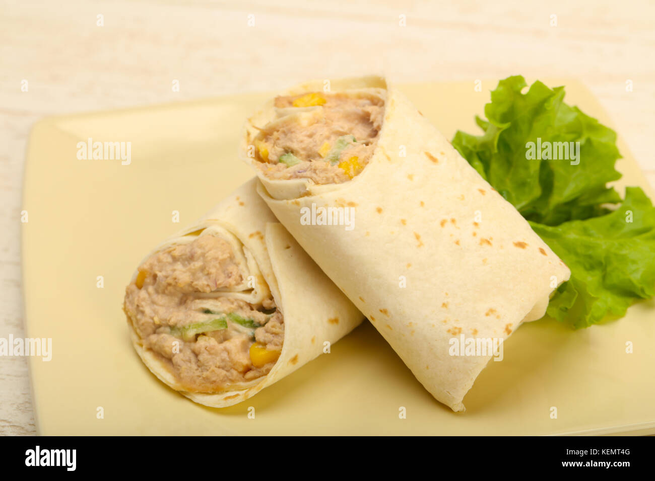 Tuna bread roll with salad leaves Stock Photo - Alamy