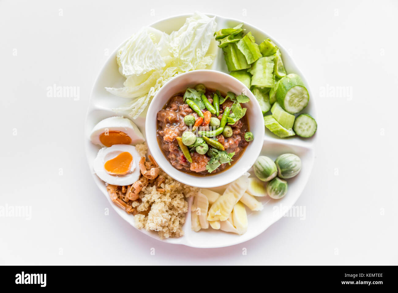 Thai chili paste with fresh vegetables on white background Stock Photo ...
