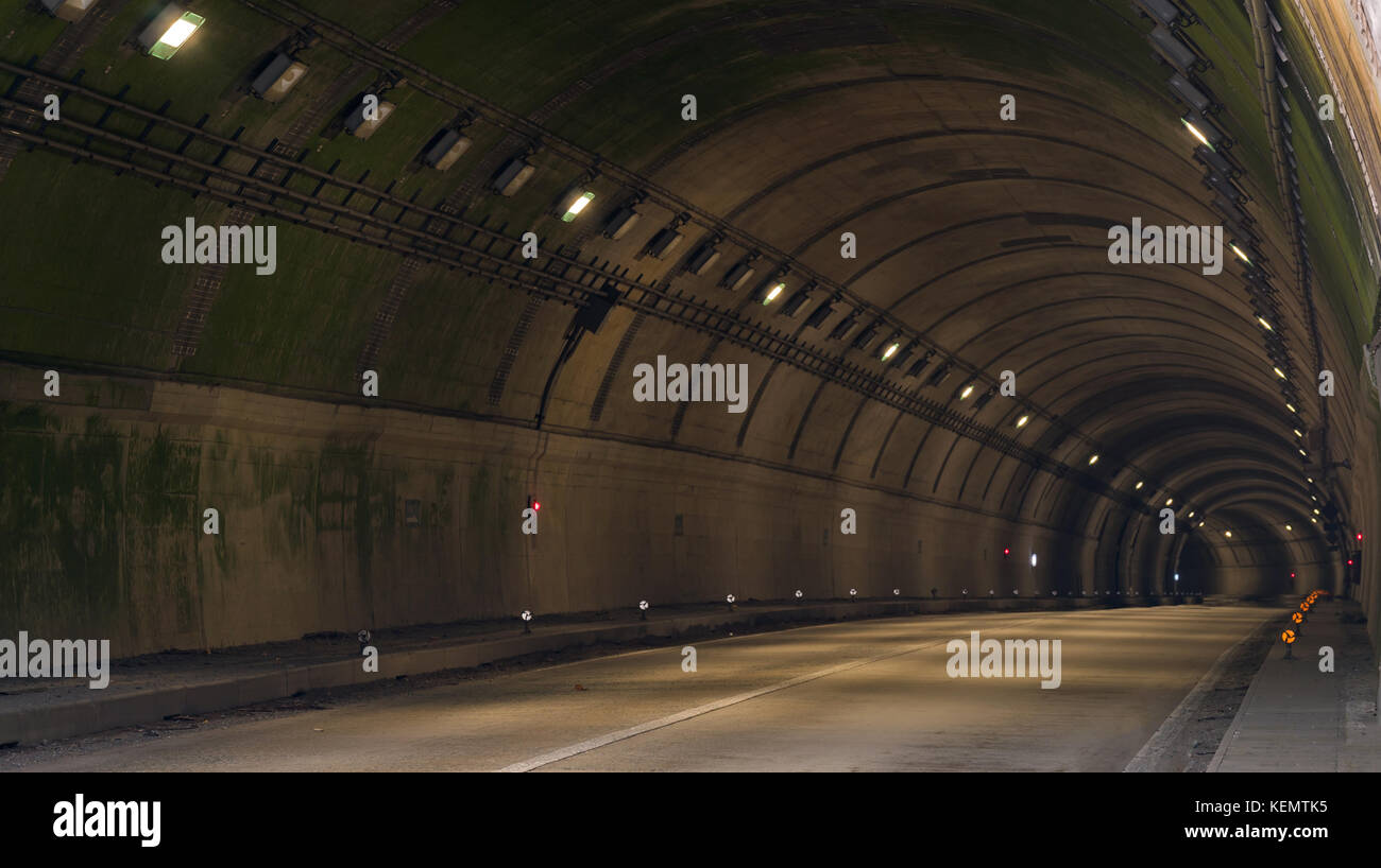 Tunnel Road with two lane highway Stock Photo - Alamy