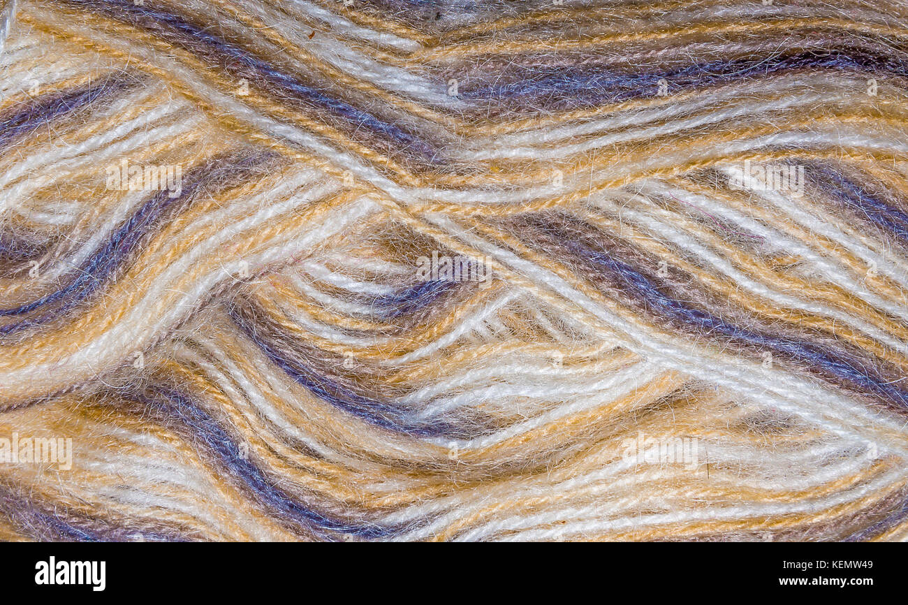 background thread for knitting. Knitting pattern of colorful yarn wool ...