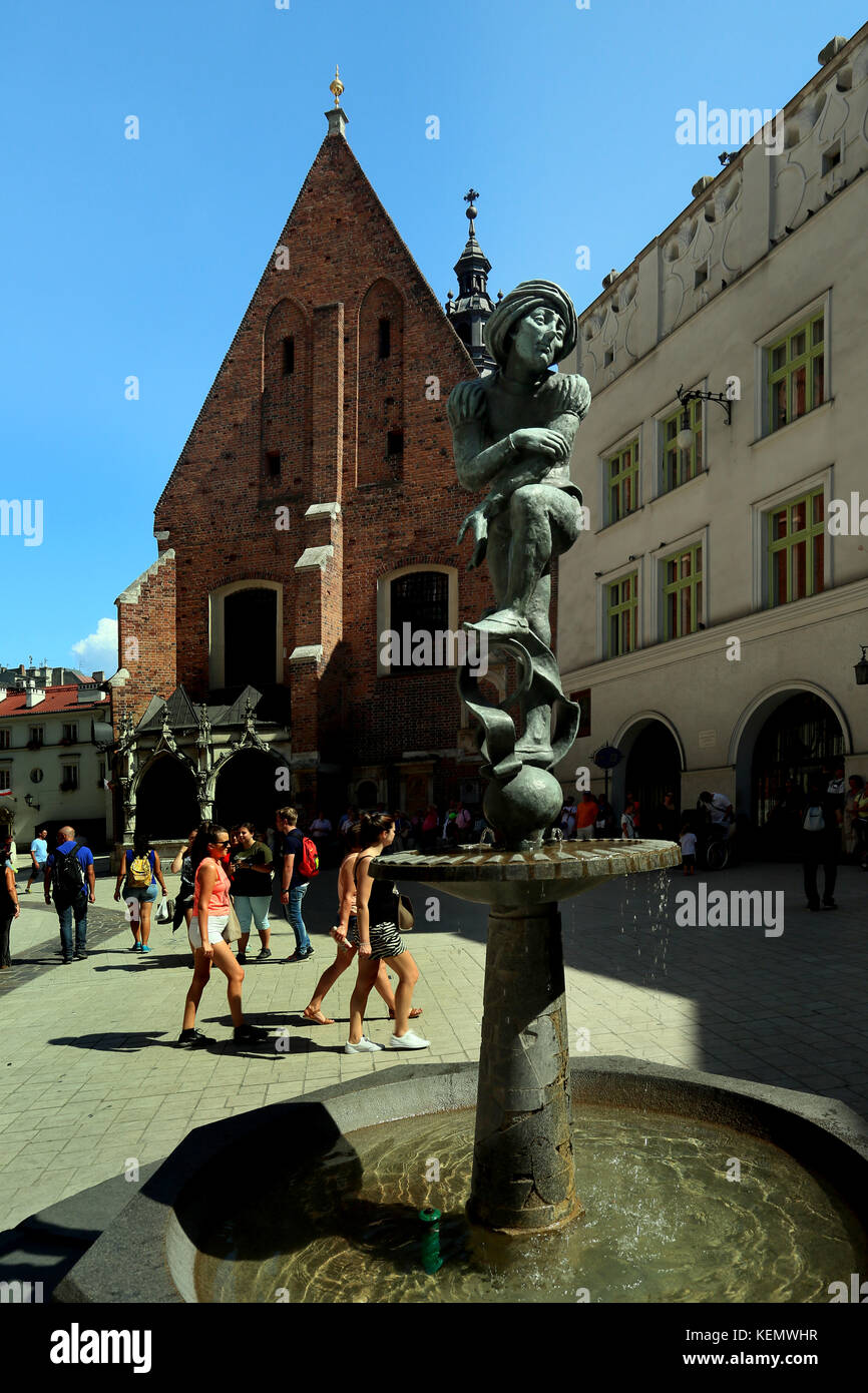 Statue in Rynek Glowny, Old City of Krakow, Poland Stock Photo - Alamy