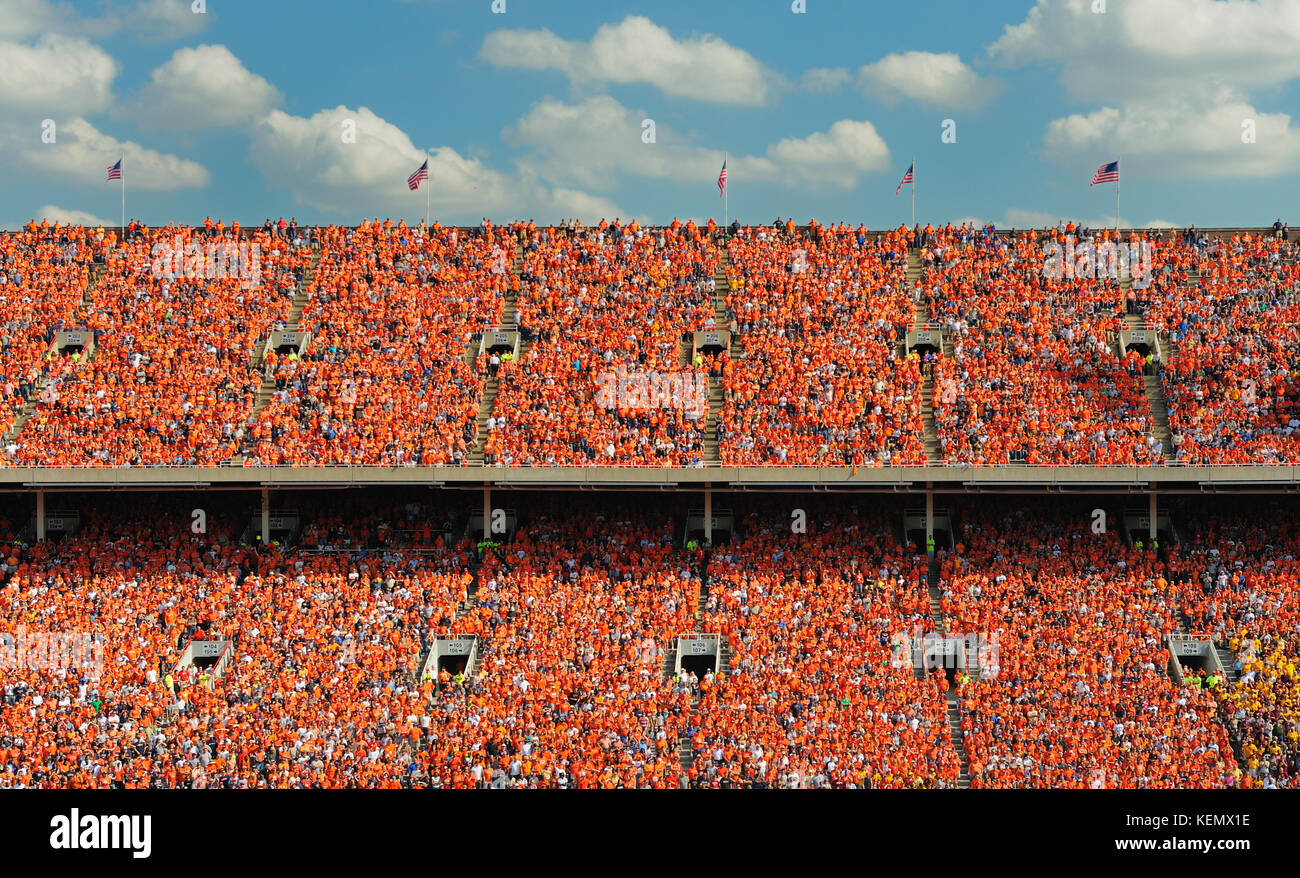 Crowd of thousands all dressed in orange at a college football game ...