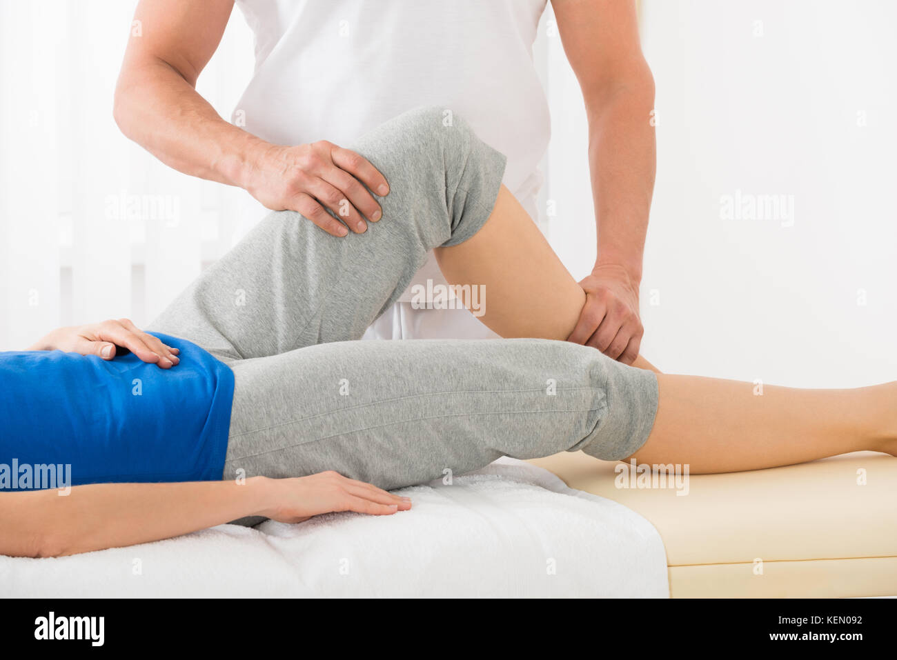 Physiotherapist doing knee massage patient hi-res stock photography and ...
