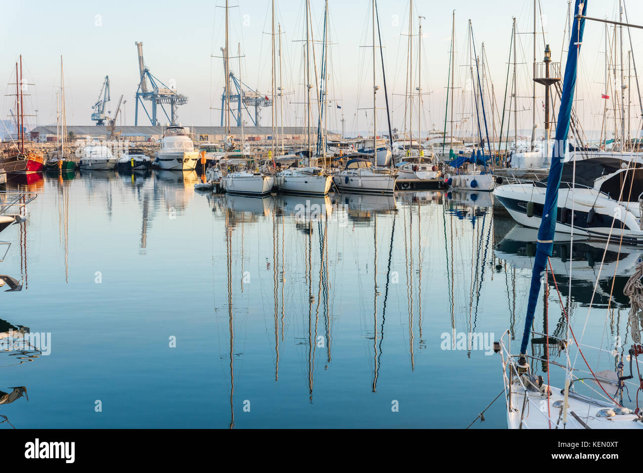 Larnaca Marina in early morning blue sky and red orange clouds Stock ...