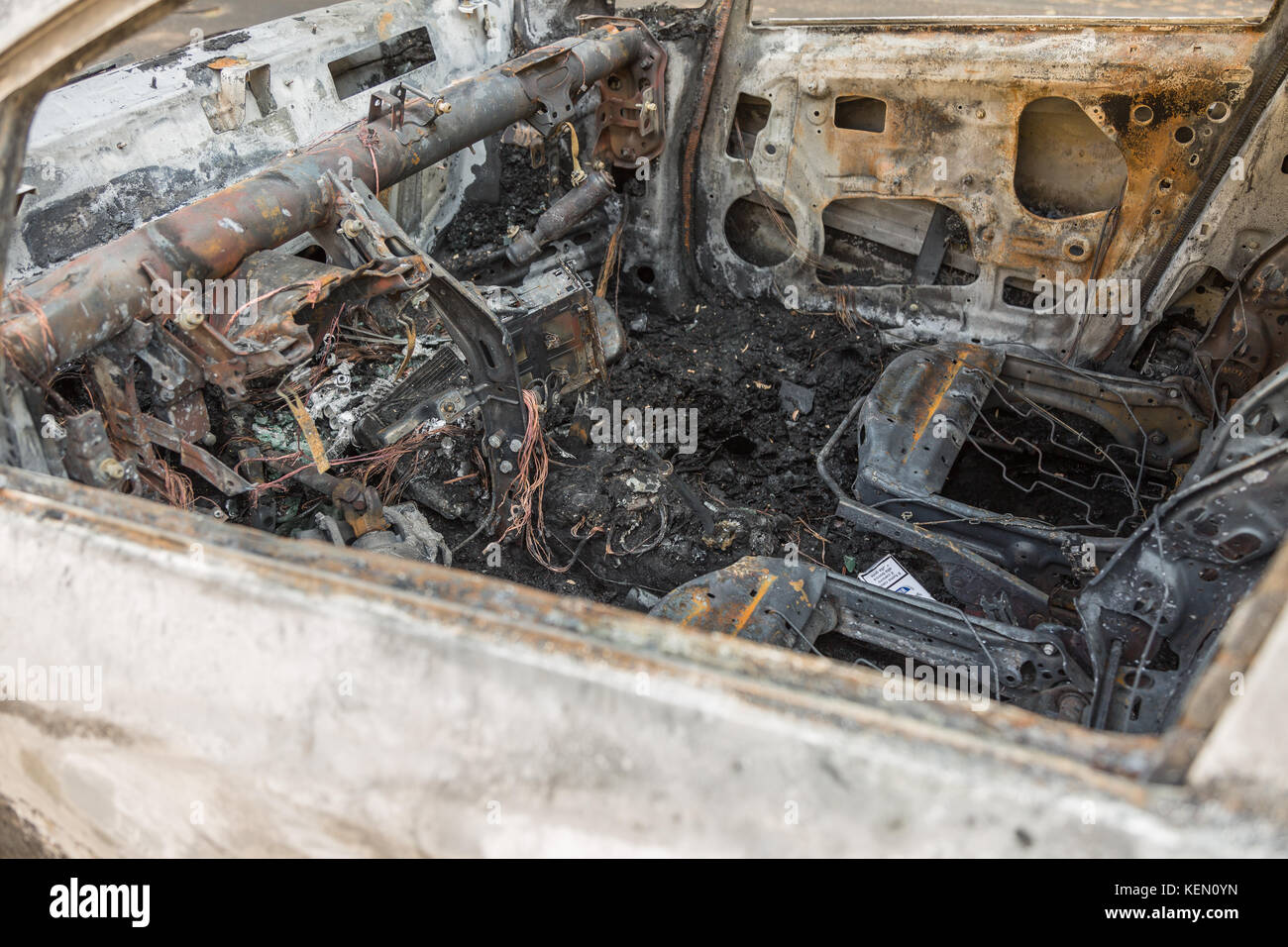 Close-up of Burned Out Car on the Street Stock Photo - Alamy