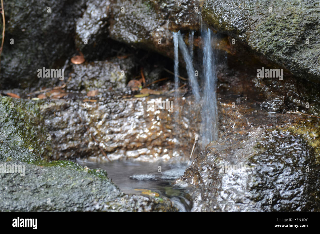 Small waterfall on the rocks Stock Photo - Alamy