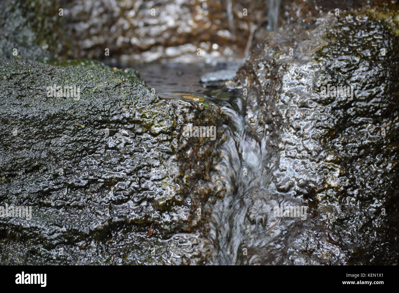 Small waterfall on the rocks Stock Photo - Alamy