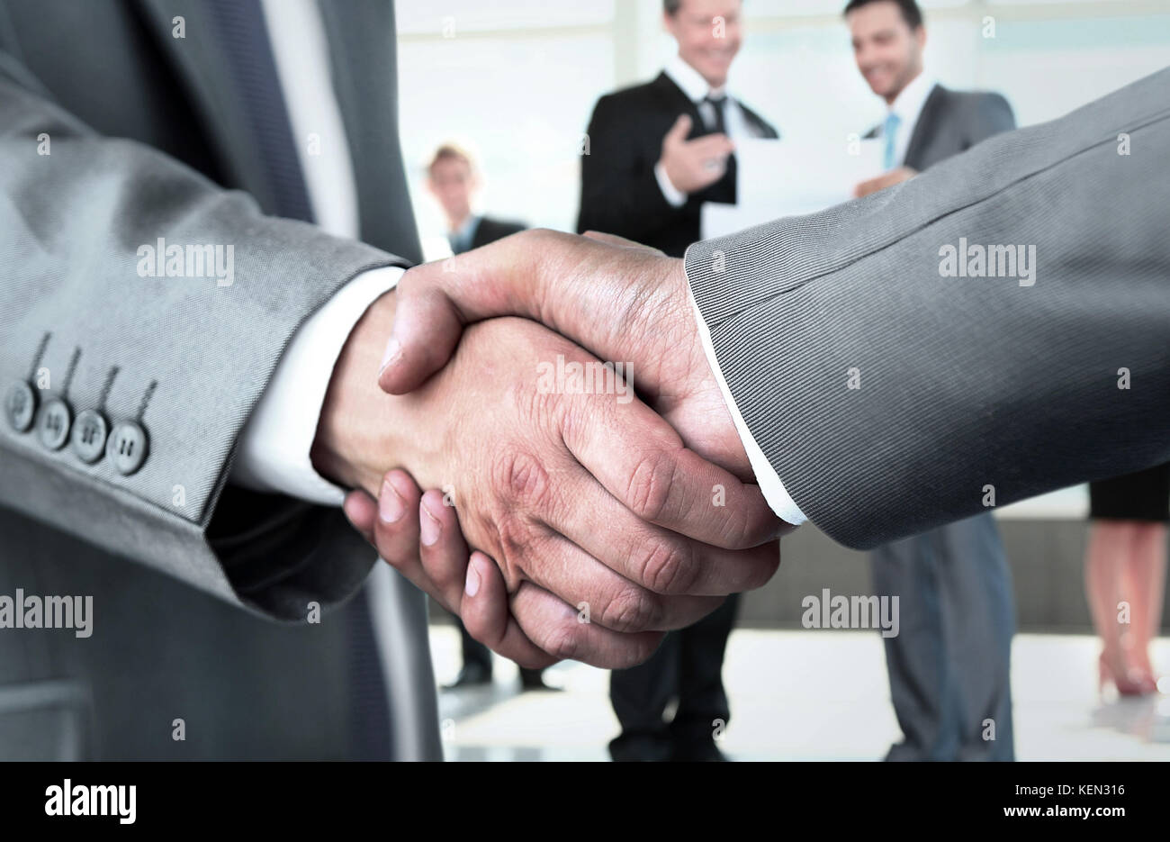 Closeup of a business handshake Stock Photo - Alamy