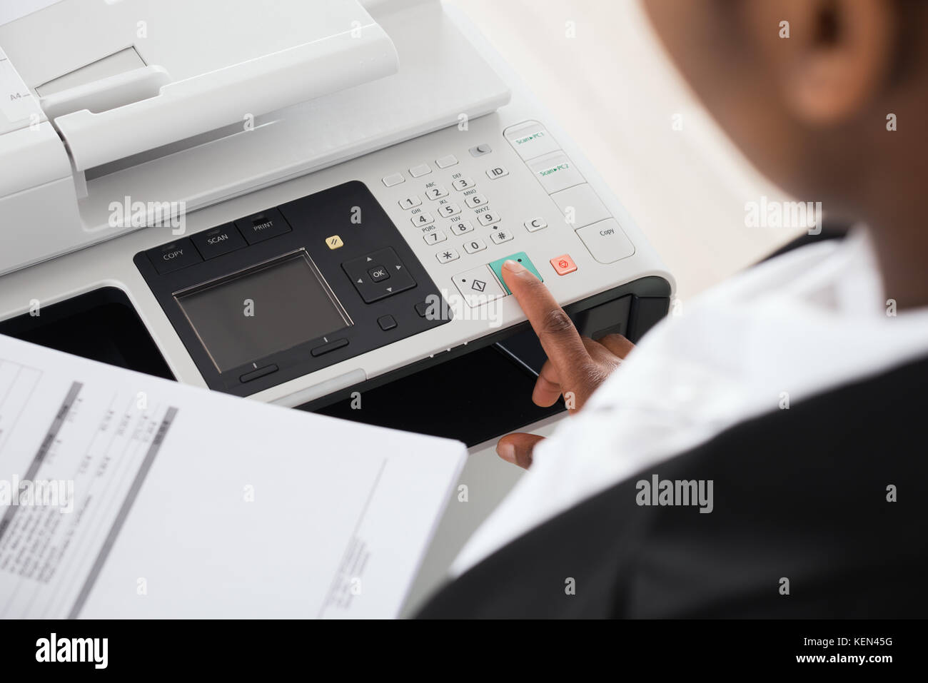Close-up Of Young Businesswoman Hand Operating Printer In Office Stock ...