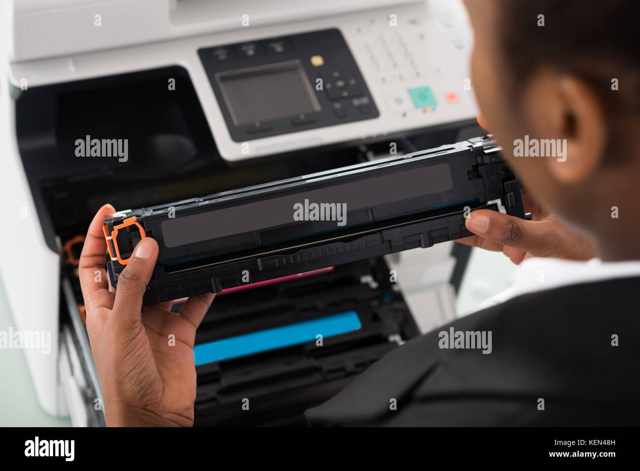 Young African Businesswoman Fixing Cartridge Near Photocopy Machine In ...