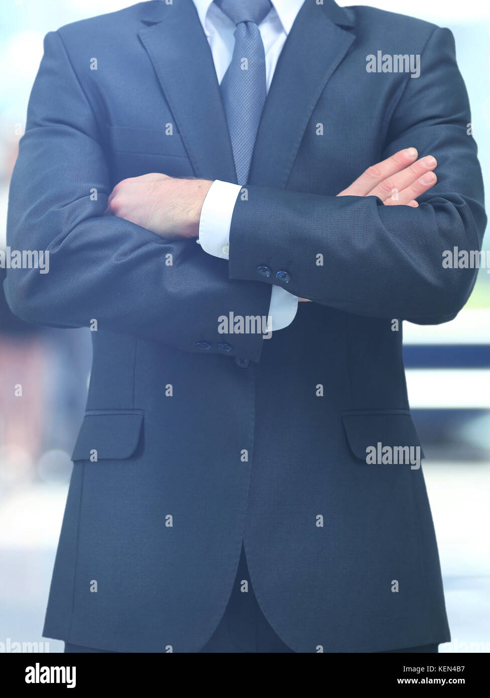 business man standing in an office Stock Photo - Alamy