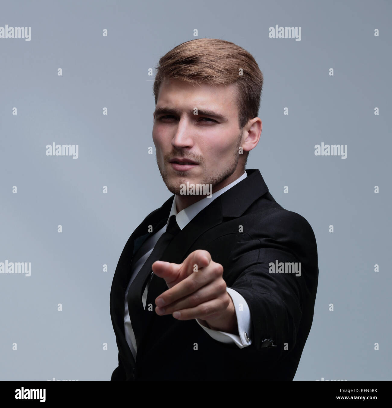 Portrait of a successful business man showing his index finger Stock ...