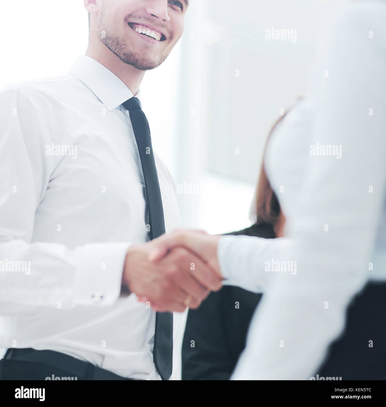 Business man shaking hand to partner Stock Photo - Alamy