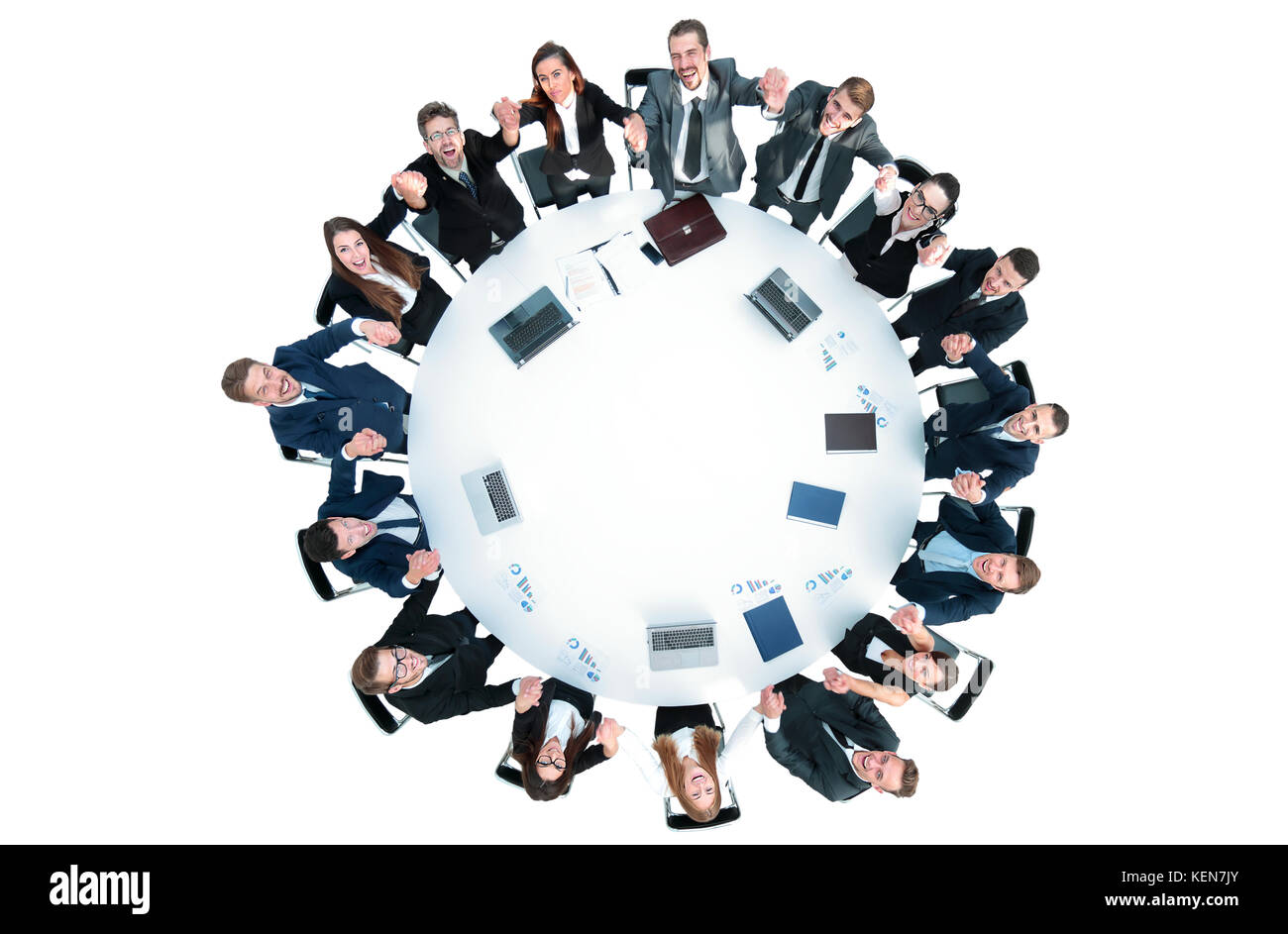 Happy business team pointing at something Stock Photo - Alamy