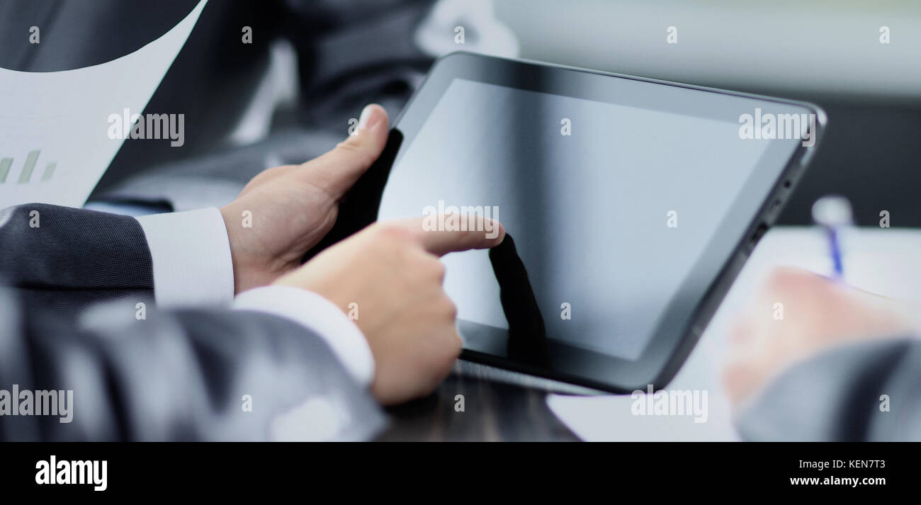 man holding digital tablet, closeup Stock Photo - Alamy