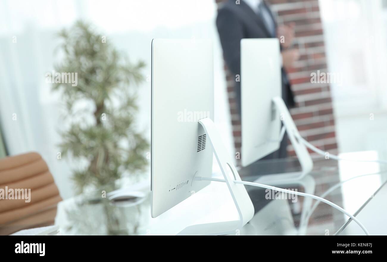 Blurred image of a workplace in the office. business background Stock ...