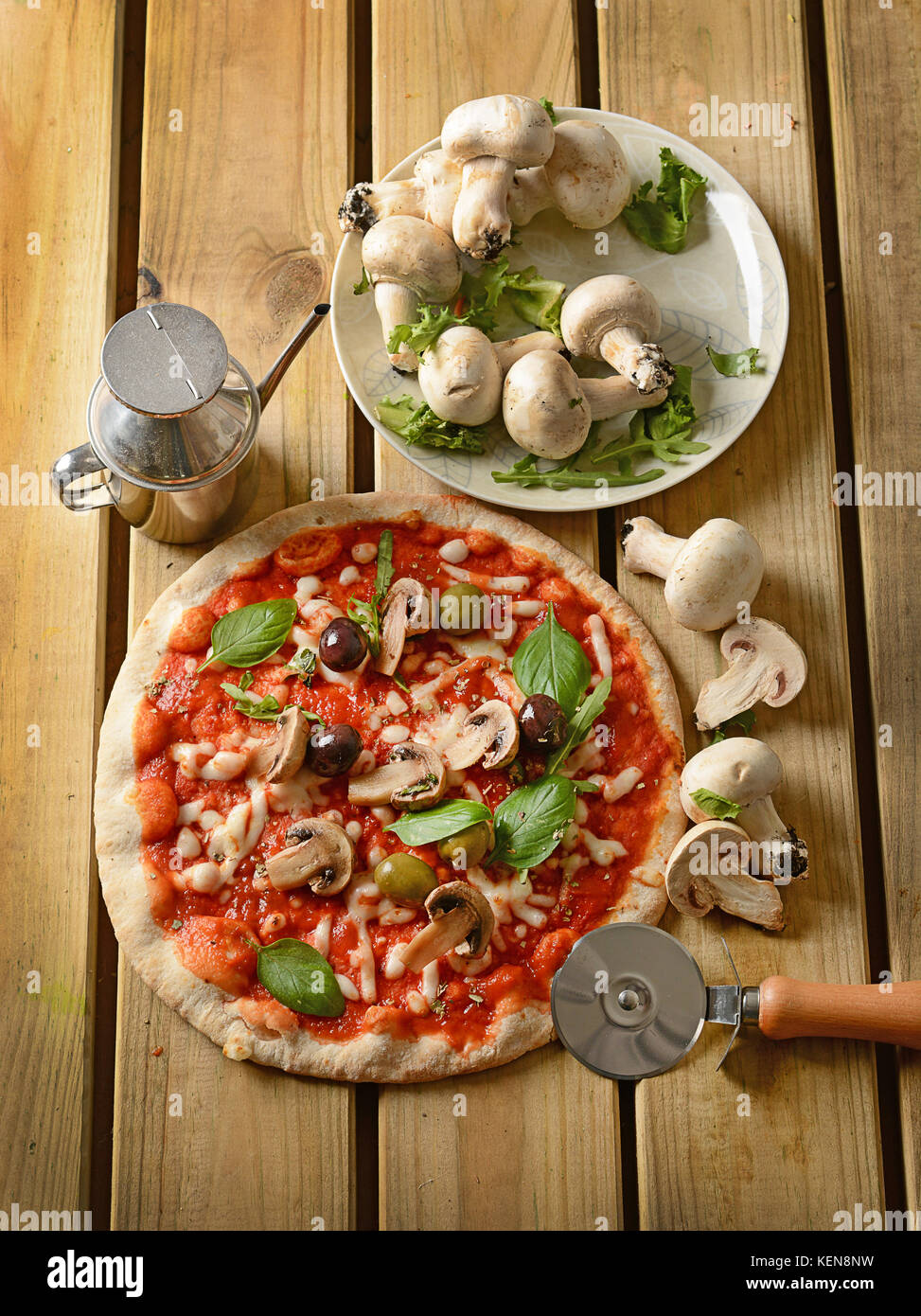 Pizza with champignon mushrooms and black olives - closeup Stock Photo ...