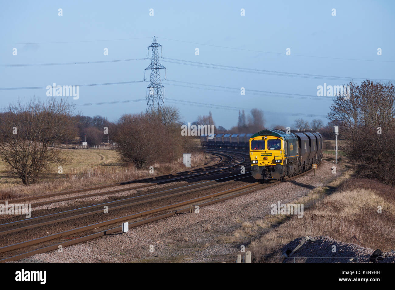 Freightliner class 66 locomotive passes Burton Salmon (East of ...