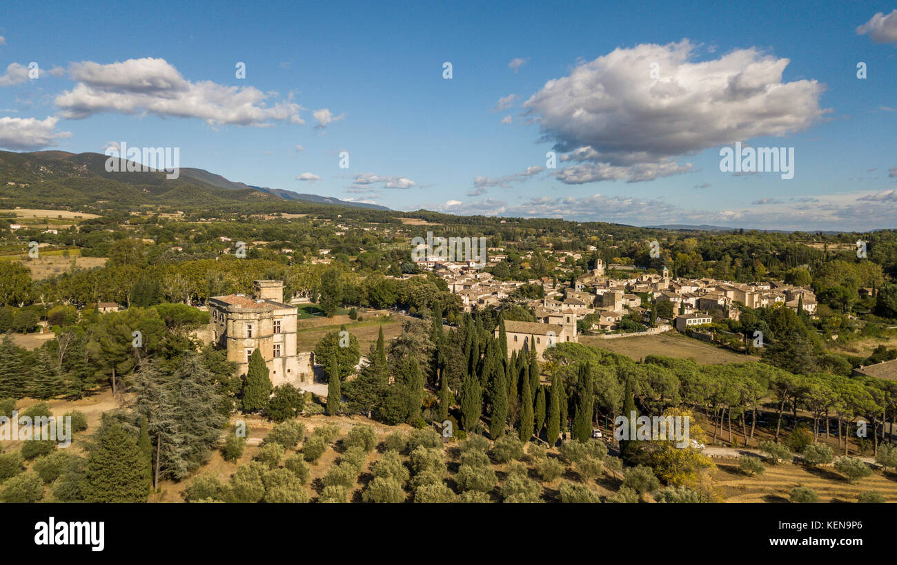 Aerial view of Lourmarin castle and village in southeastern France ...