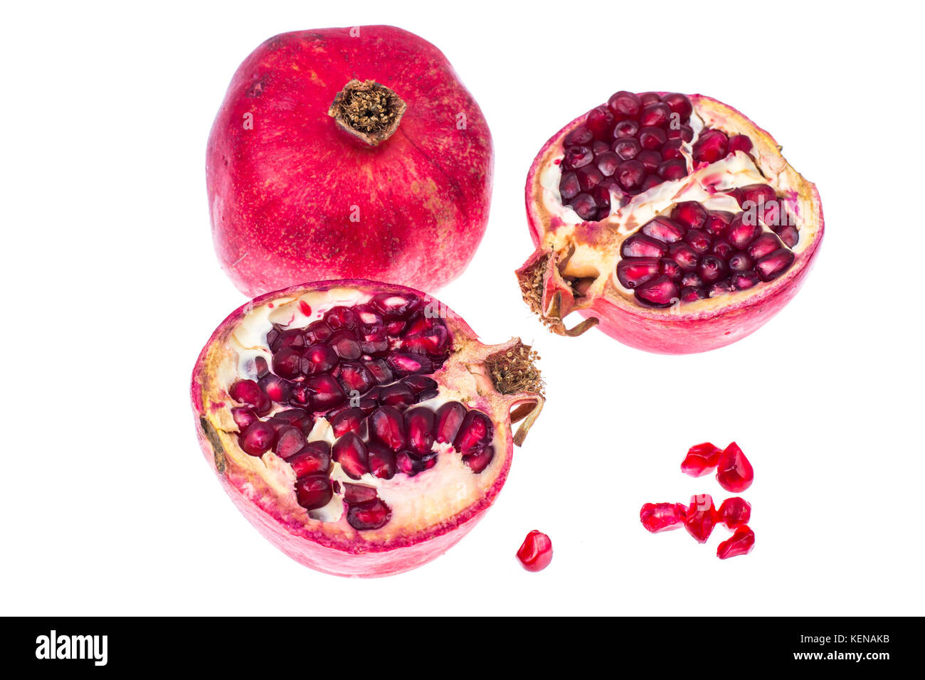 Ripe red pomegranates on white background. Studio Photo Stock Photo - Alamy