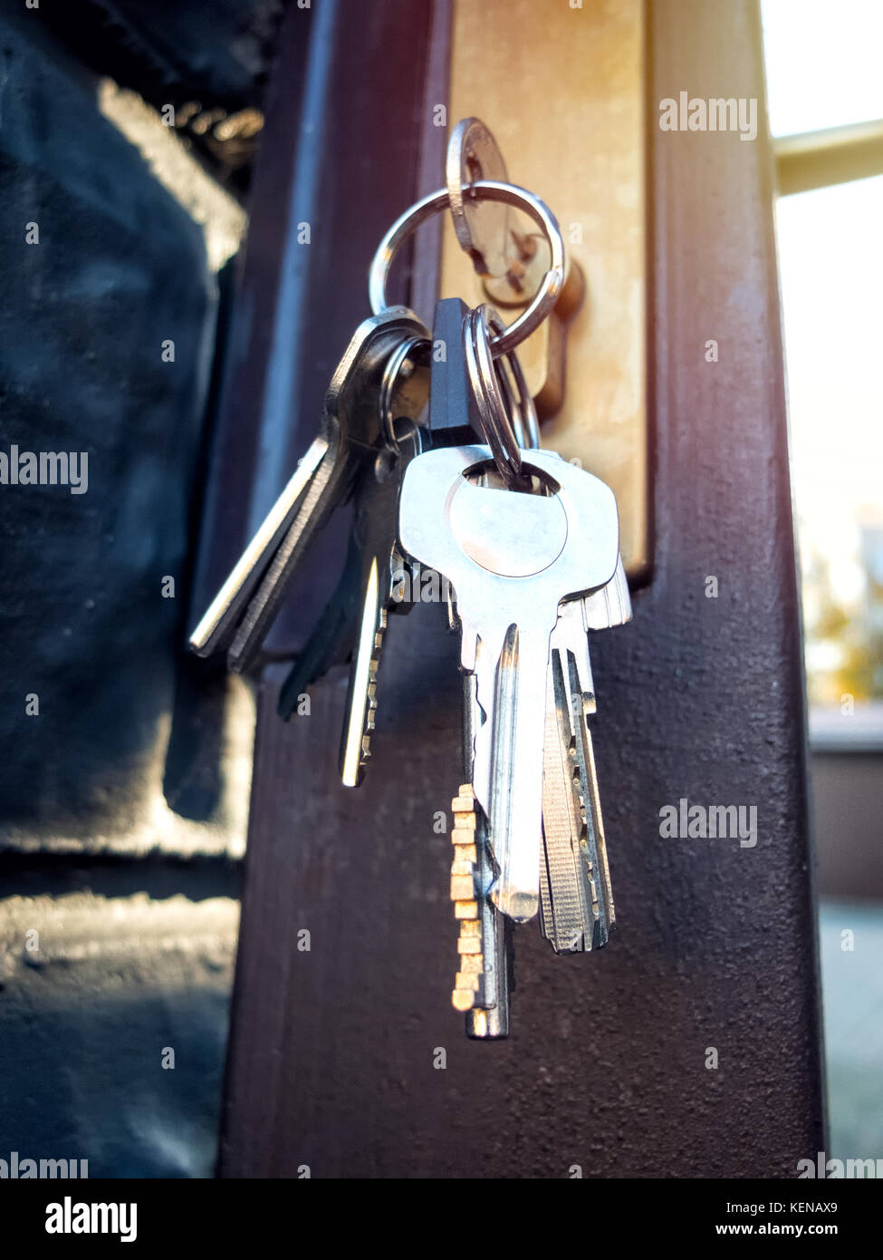 Bunch of keys in the keyhole of the gate Stock Photo - Alamy