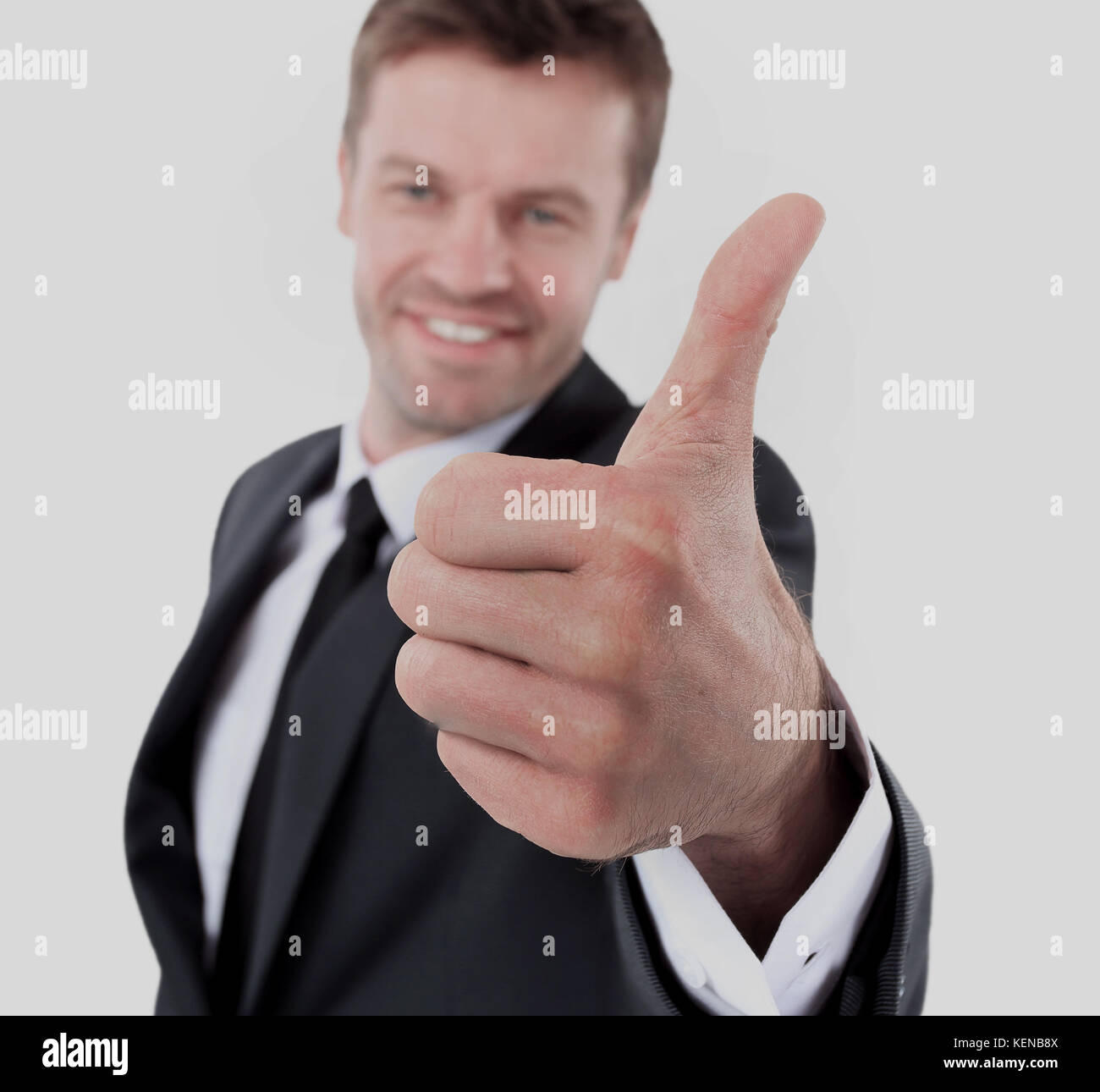 Business man thumps up isolated on white background Stock Photo - Alamy