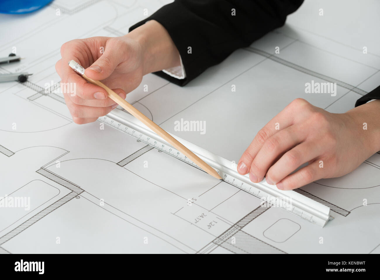 Close-up Photo Of Businesswoman Hand Drawing Blueprint Stock Photo - Alamy