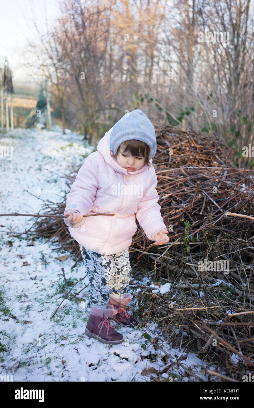 A child playing with stick Stock Photo - Alamy