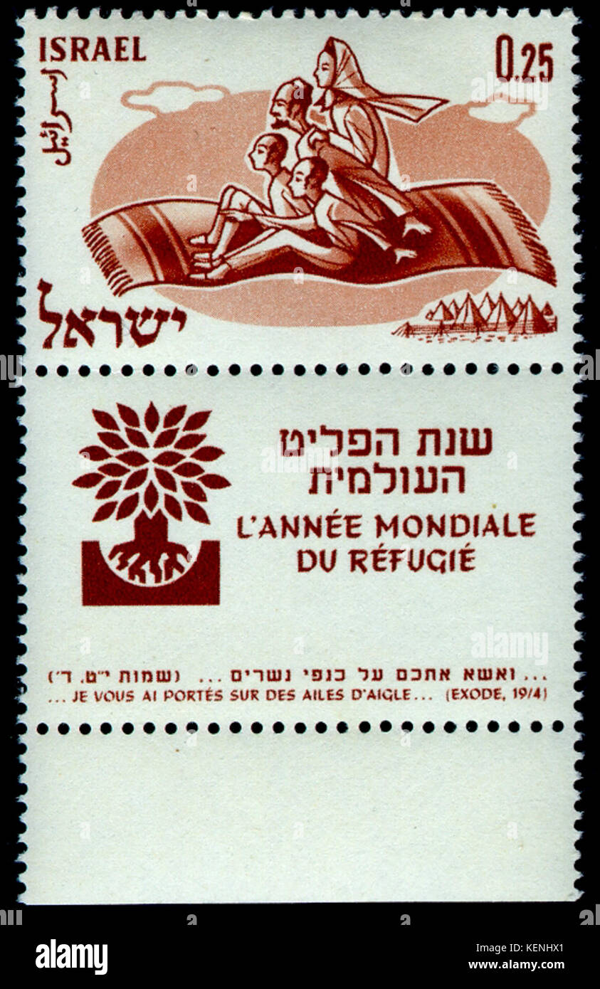 A stamp issued for the International Refugee Year, featuring a ...
