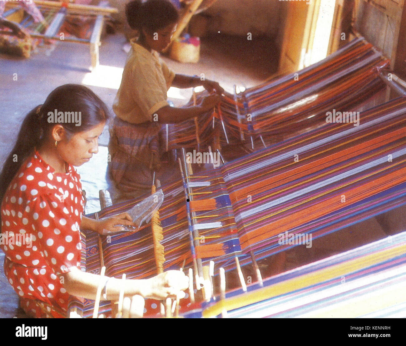 This image captures Tais weaving in Lospalos, East Timor, a traditional ...
