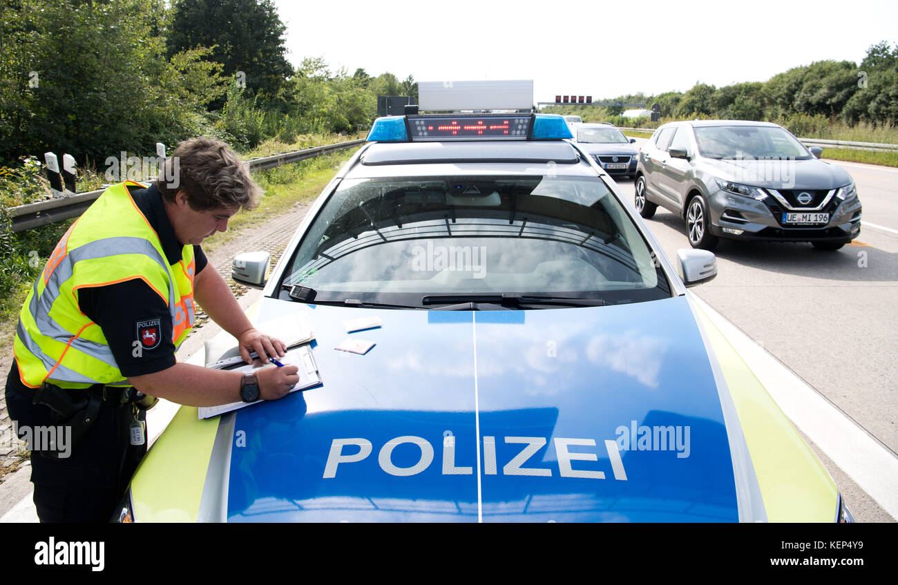 Hanover, Germany. 25th Aug, 2017. An officer of the motorway police ...